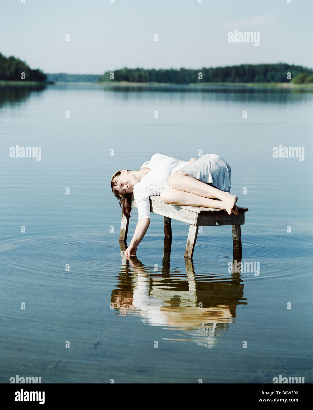 Lying on a bench hi-res stock photography and images - Alamy