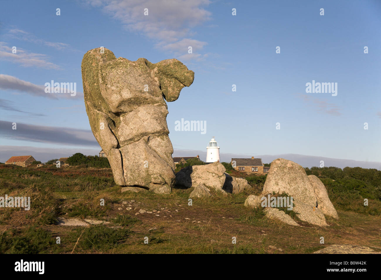 Nag s Head stone and the Lighthouse St Agnes Isles of Scilly Stock ...