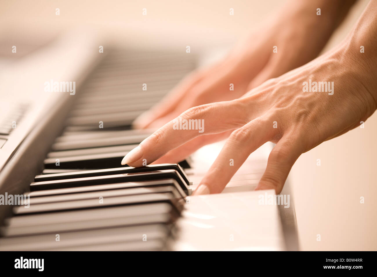 Man playing keyboard Stock Photo - Alamy