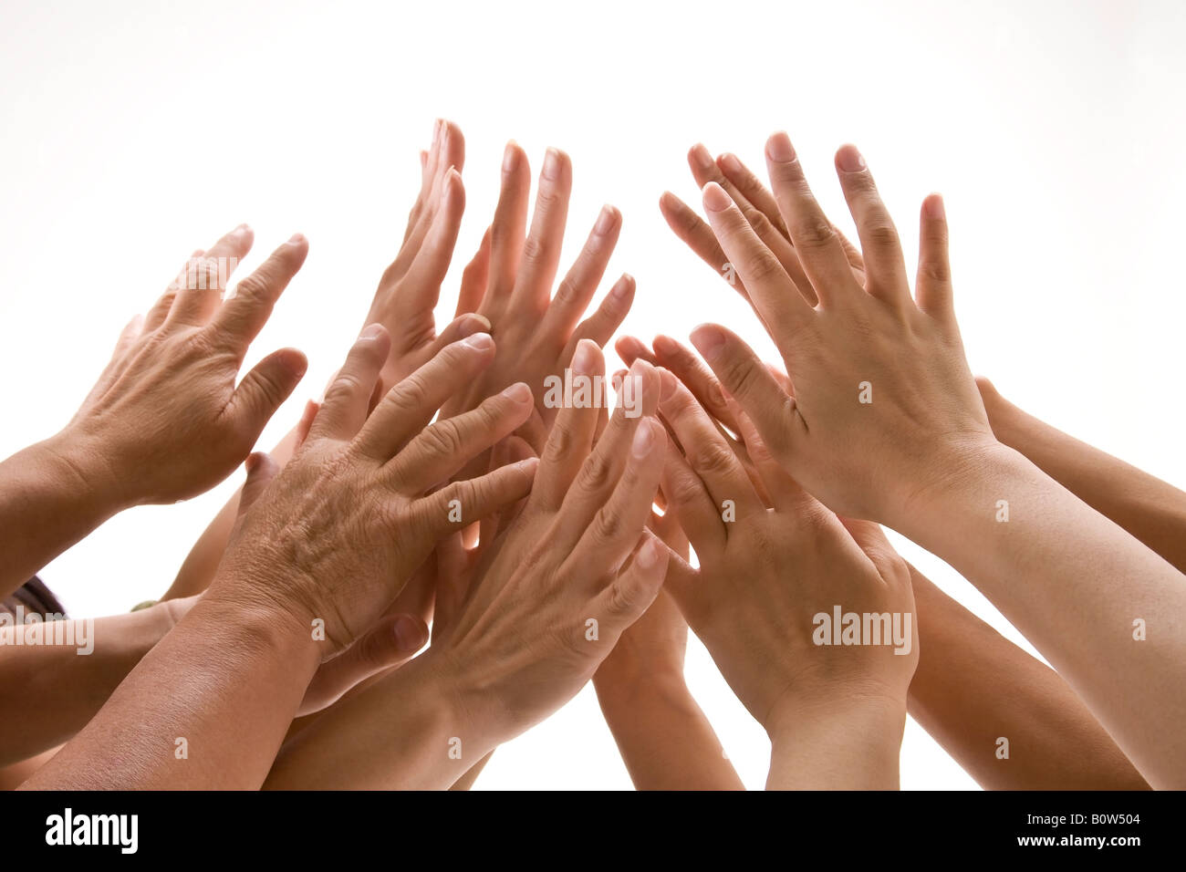 Group of people in huddle Stock Photo - Alamy