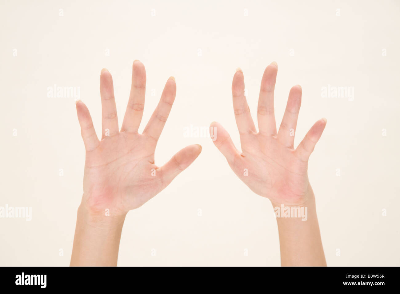 Adult hands Cut Out Stock Images & Pictures - Alamy