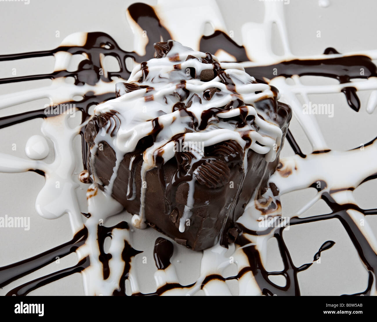 chocolate cake drizzled with chocolate and white chocolate Stock Photo ...
