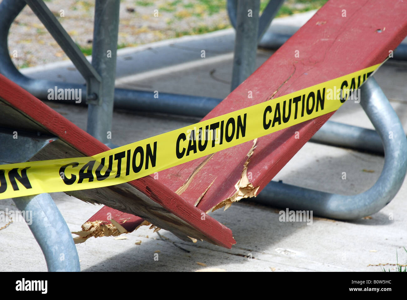 Caution tape on a broken wooden bench Stock Photo - Alamy