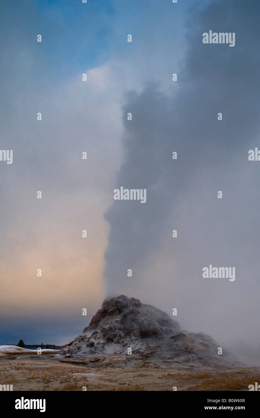 Steam venting during eruption of White Dome Geyser on a stormy autumn ...
