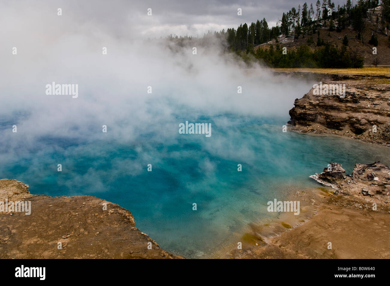 Geothermal steam rising out of Excelsior Geyser Crater Midway Geyser ...