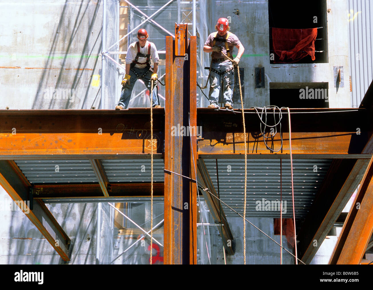 Construction site. New housing development. Metal girders and hard hat ...