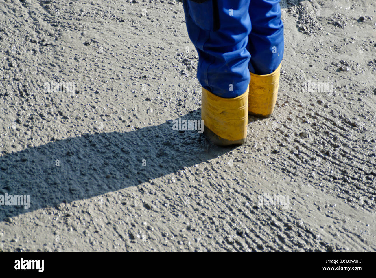 Laying a concrete foundation slab for a single family detached house ...