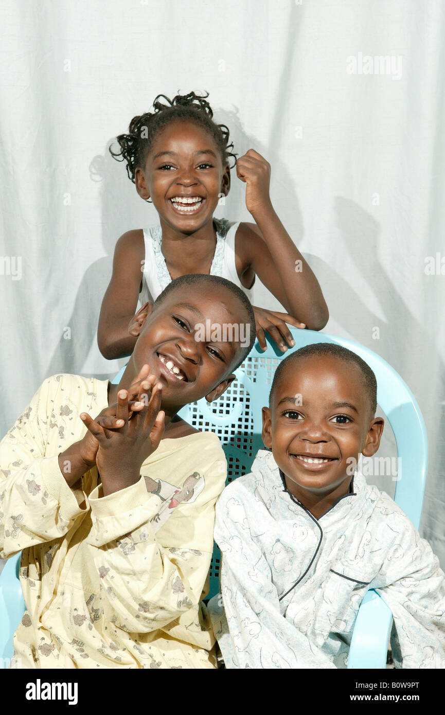 Three kids at a pajama party, Garoua, Cameroon, Africa Stock Photo - Alamy