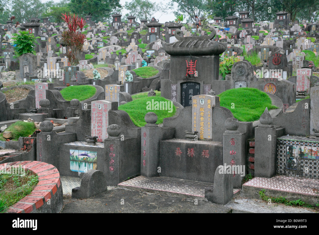 Graves at a multi-denominational cemetery in Singapore, Southeast Asia ...