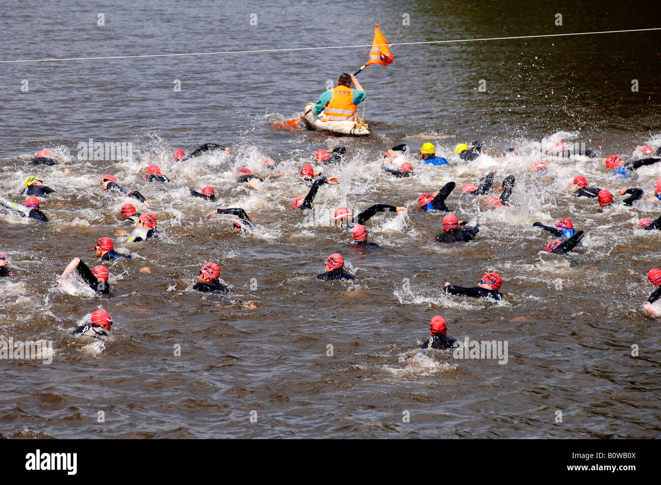 Triathlon swimmers swimming in the Naab River, Kallmuenz, Oberpfalz ...