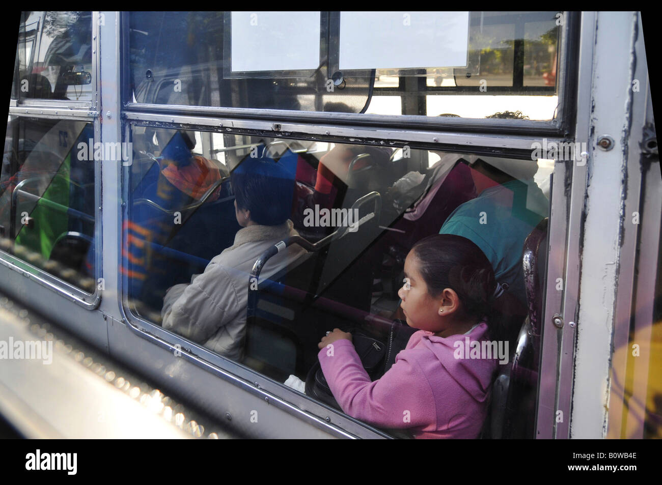 Child in a public transit bus, Mexico City, Mexico, North America Stock ...
