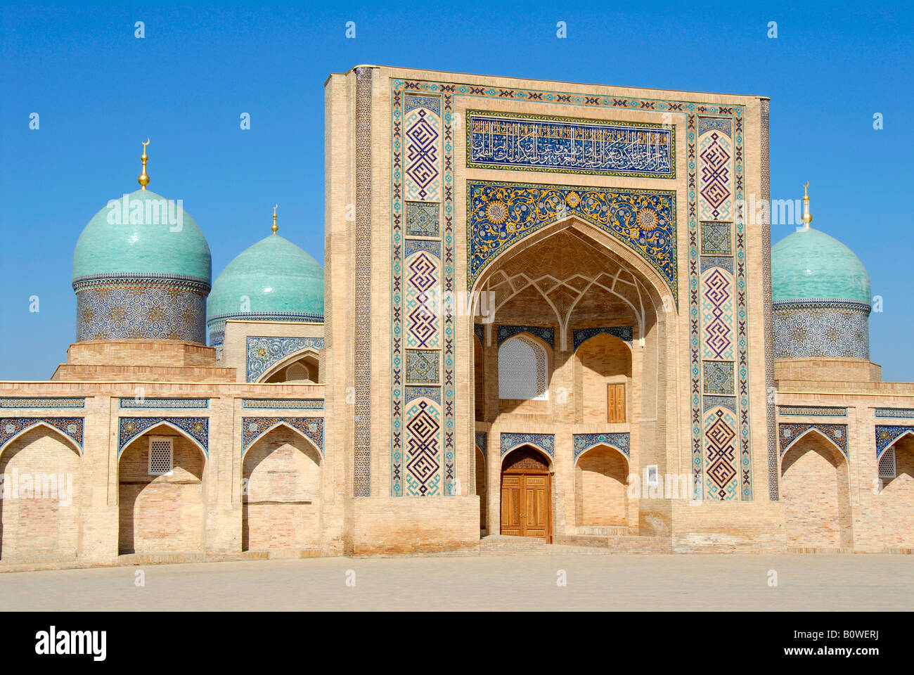 Iwan or eyvan entrance gate covered with blue tiles, blue domes, Jama ...