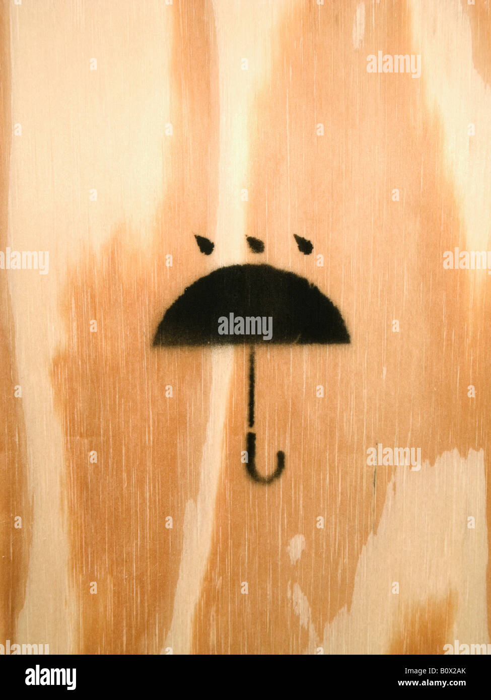 The ‘do not get wet’ symbol stenciled on wood Stock Photo - Alamy