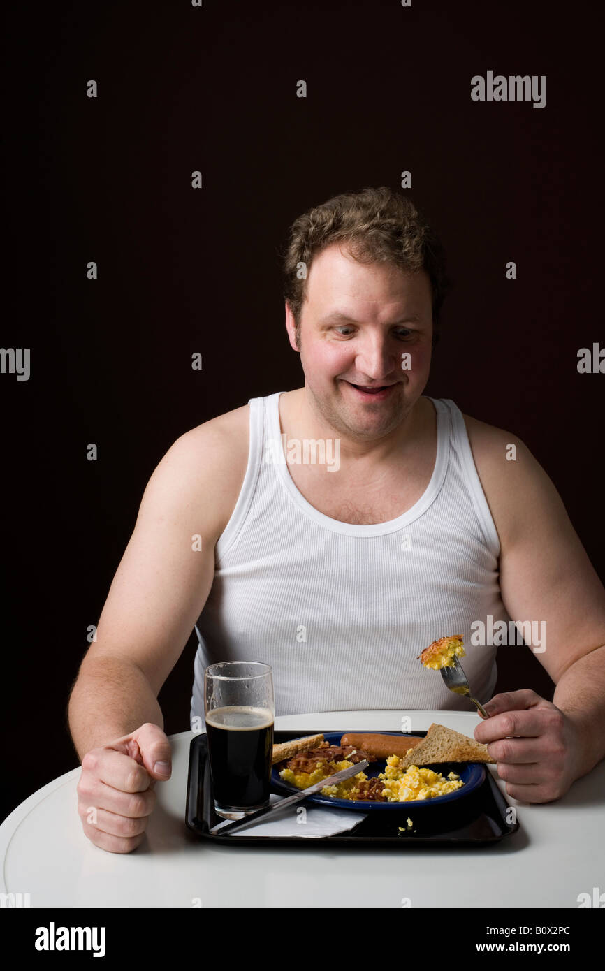 Man eating sausage bacon hi-res stock photography and images - Alamy