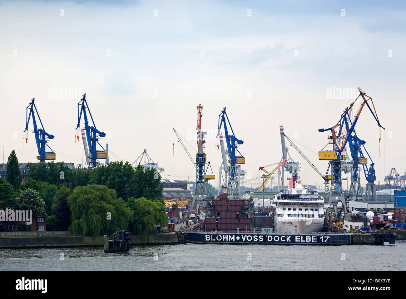 Hamburg harbour scene with norwegian cruise ship "Braemar" in dry dock ...