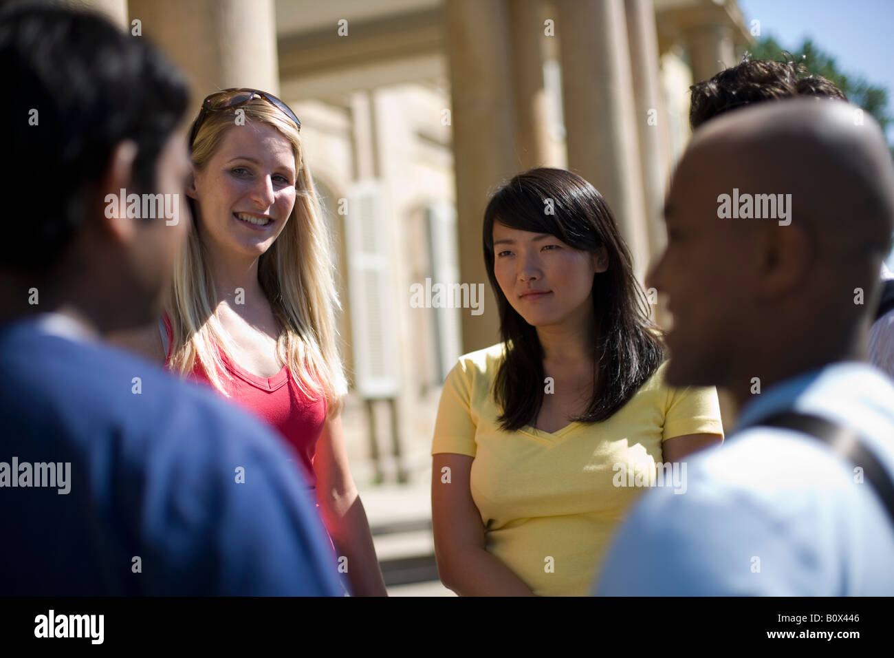 University students talking on campus Stock Photo - Alamy