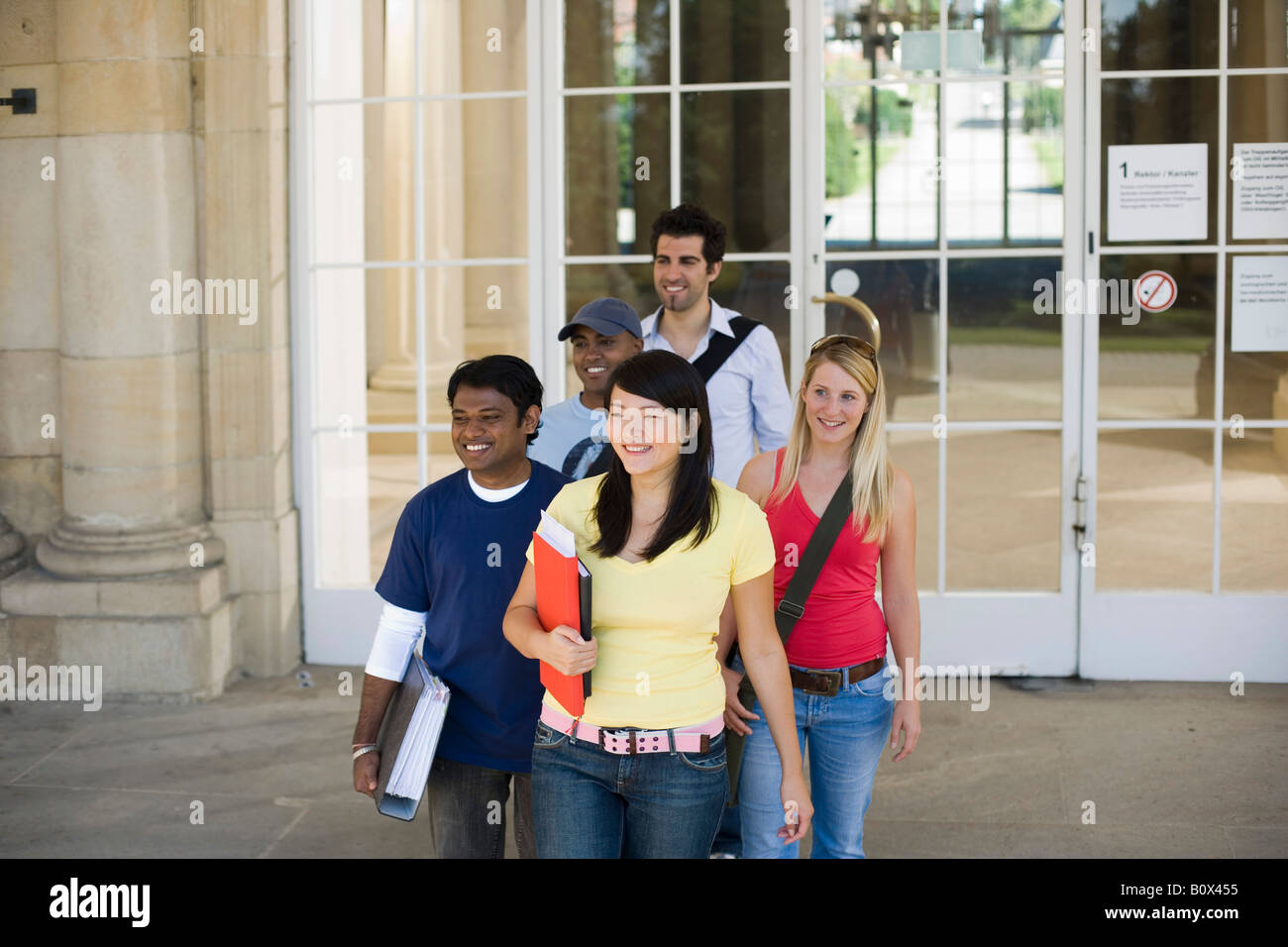 University students leaving a classroom building on campus Stock Photo ...