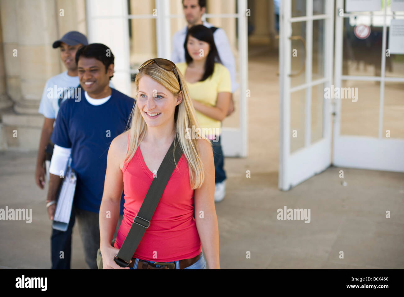 University students leaving a classroom building on campus Stock Photo ...