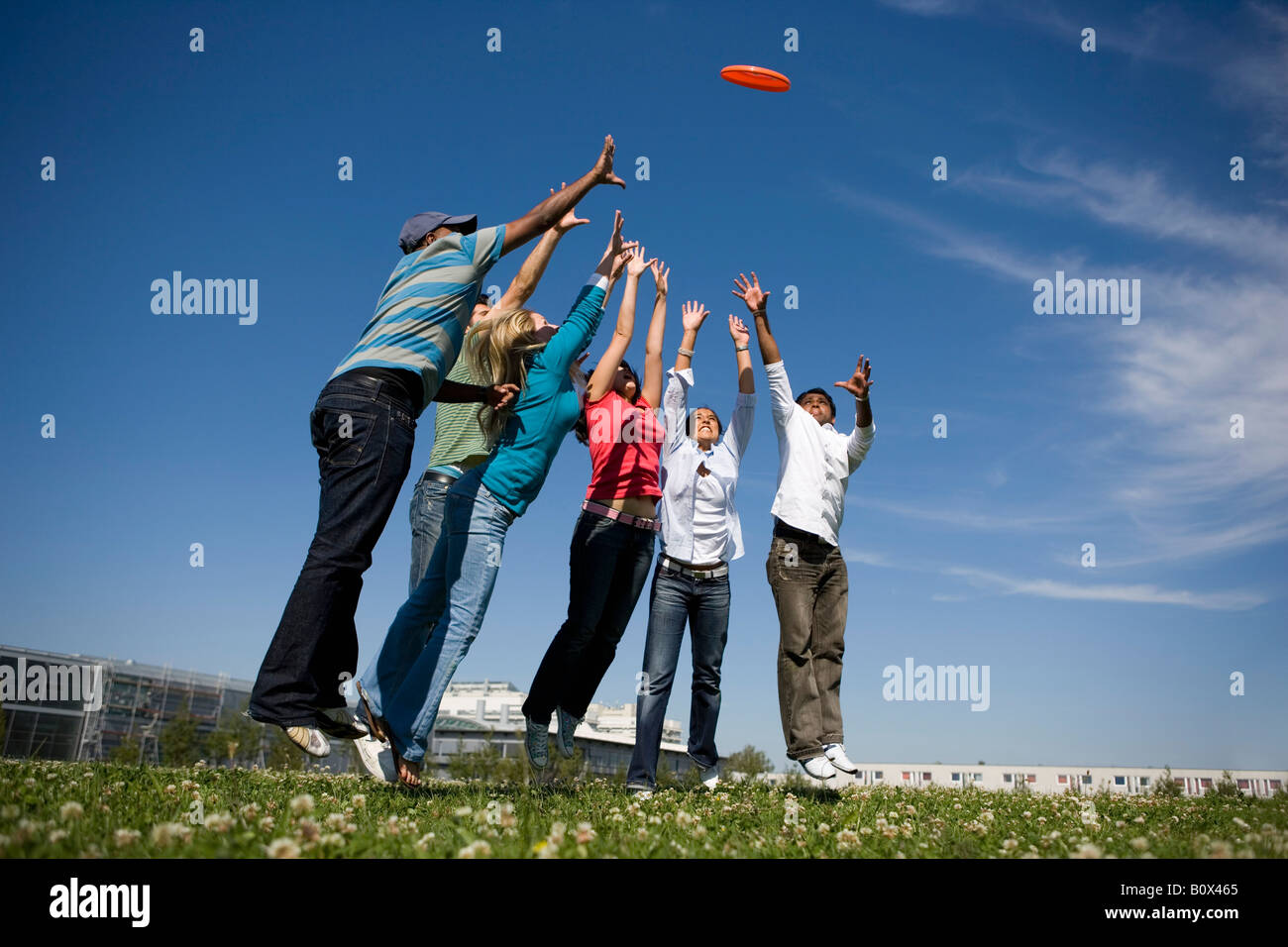 University students jumping on campus hi-res stock photography and ...
