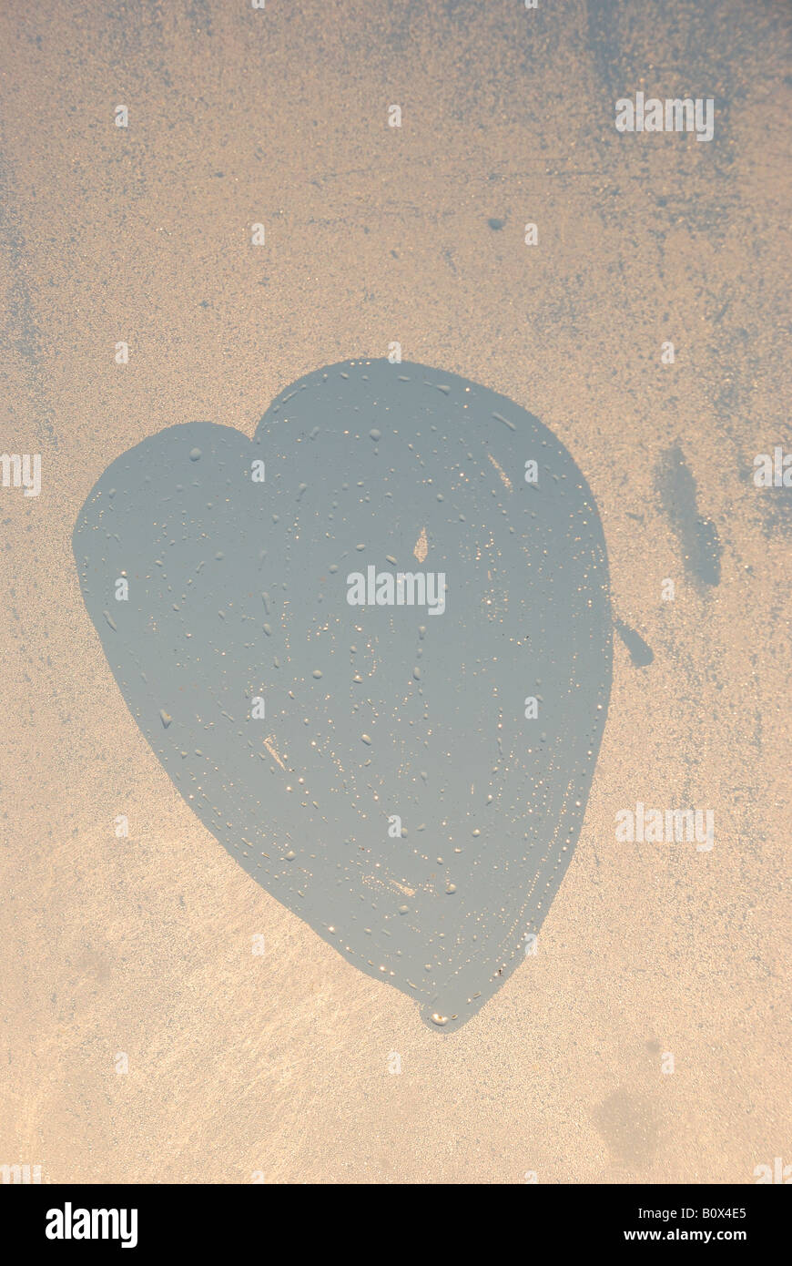 Heart on foggy window Stock Photo - Alamy