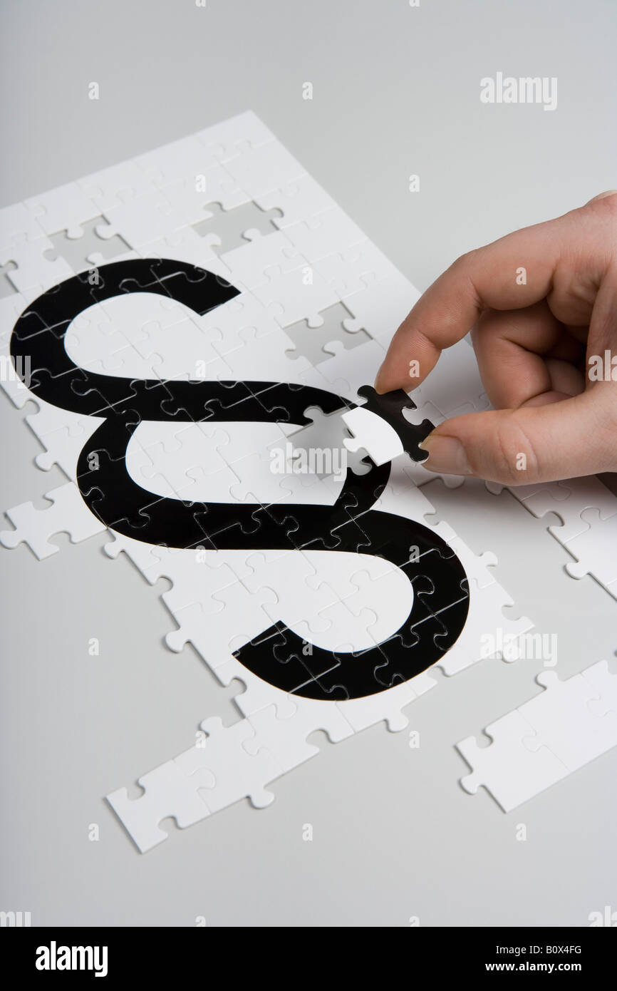 Section sign jigsaw puzzle Stock Photo - Alamy