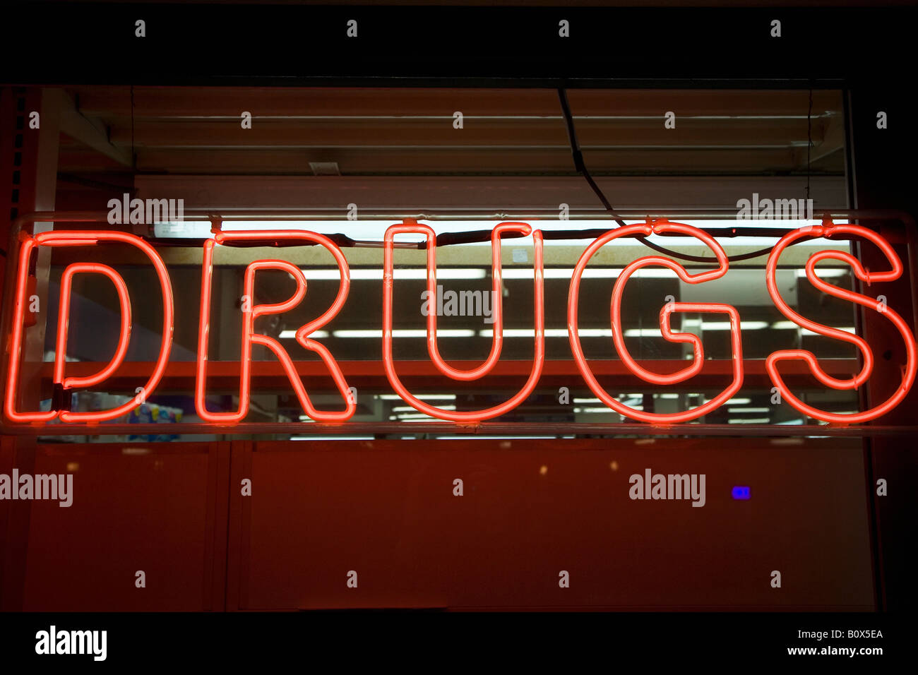 Neon ‘Drugs’ sign Stock Photo - Alamy
