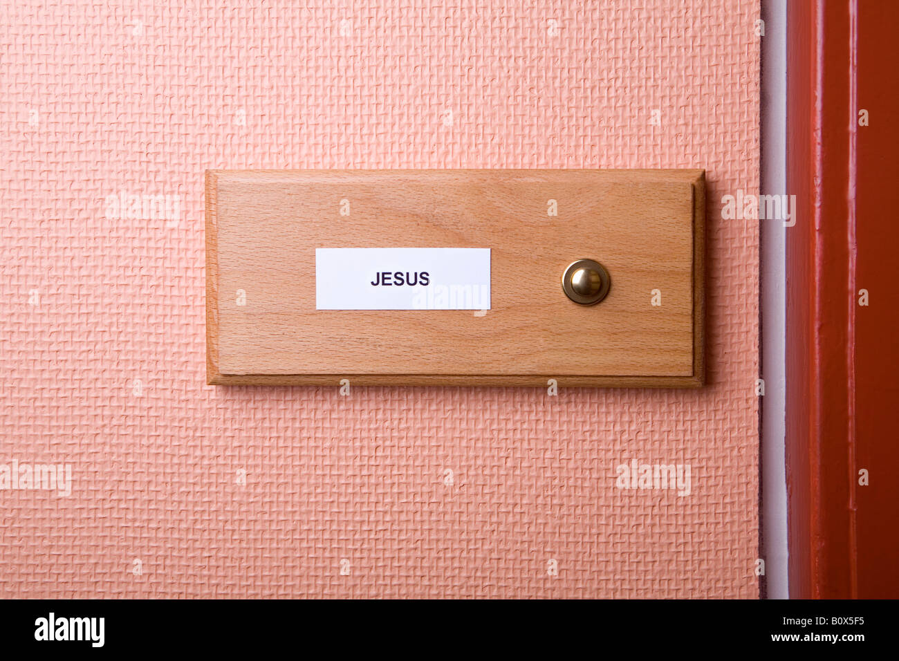 ‘Jesus’ name sticker next to doorbell Stock Photo - Alamy