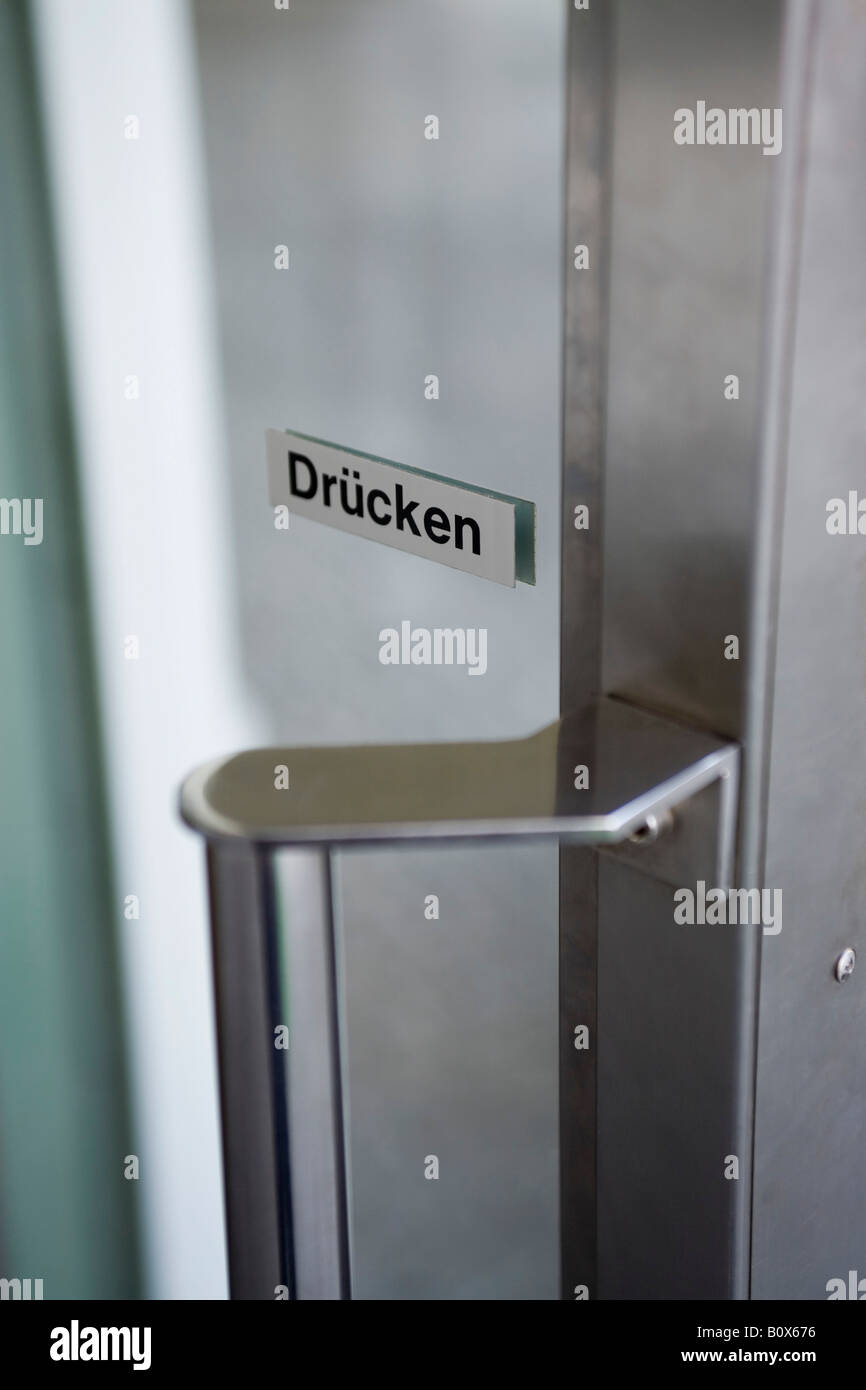 Close-up of a door with ‘push’ written in German on it Stock Photo - Alamy
