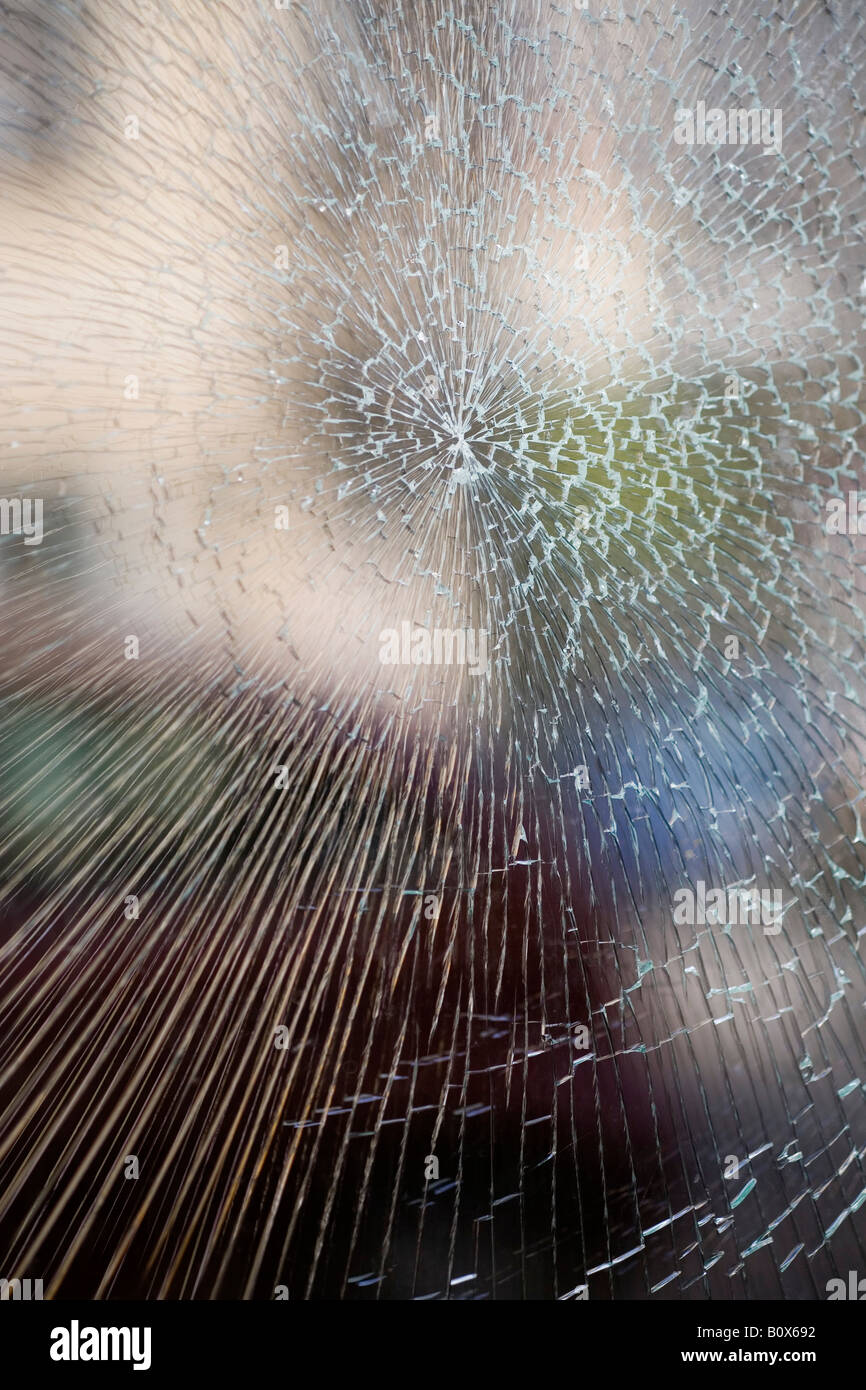 Extreme close up of a shattered window Stock Photo - Alamy