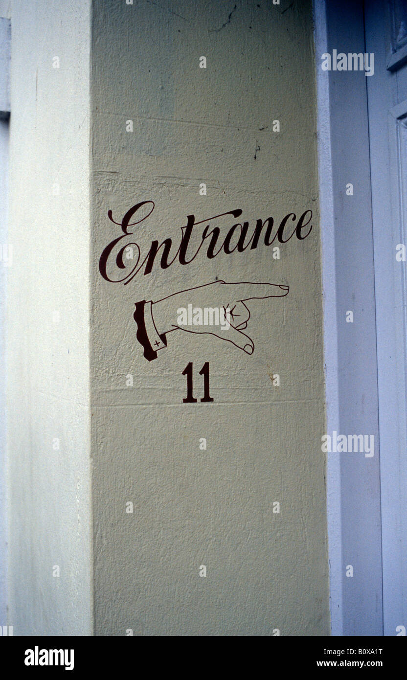 ' Entrance ' sign with hand and pointing finger, number 11 Stock Photo ...