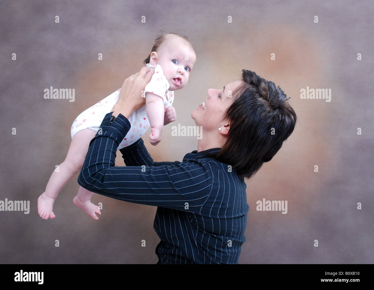 mother with 6 month old baby Stock Photo - Alamy