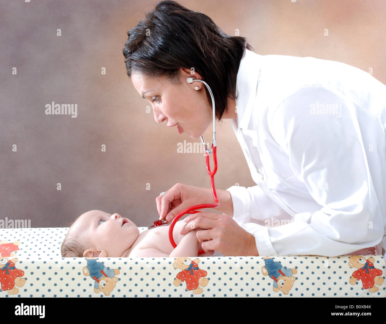 paediatrician with baby Stock Photo - Alamy