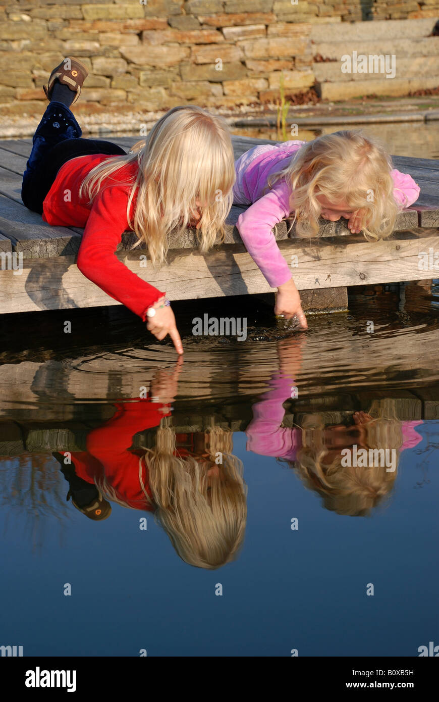 Girls pond dipping hi-res stock photography and images - Alamy
