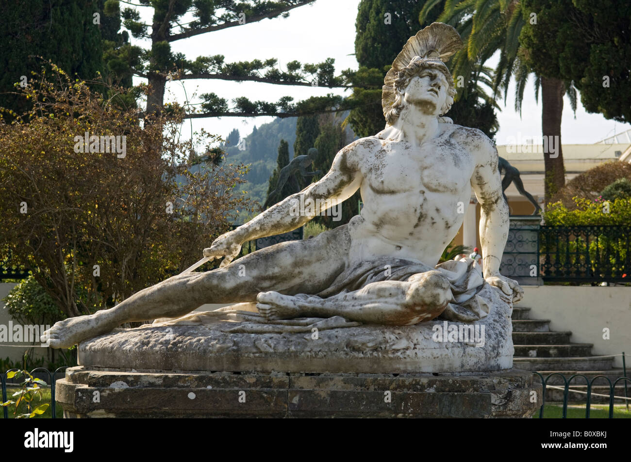 Marble statue of injured Achilles. Achilleion Museum, Corfu, Greece ...