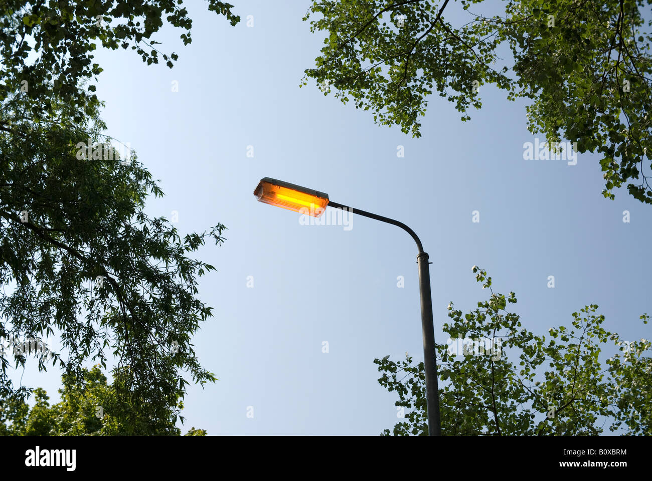 Lamp lit in daylight hi-res stock photography and images - Alamy