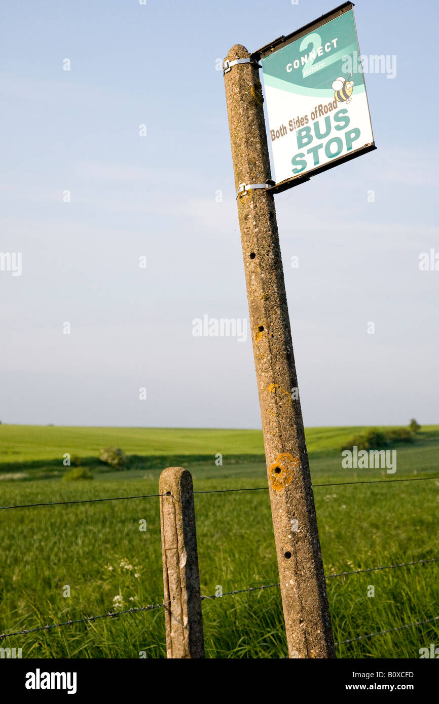A rural bus stop sign in the scenic Wiltshire countryside near Avebury ...