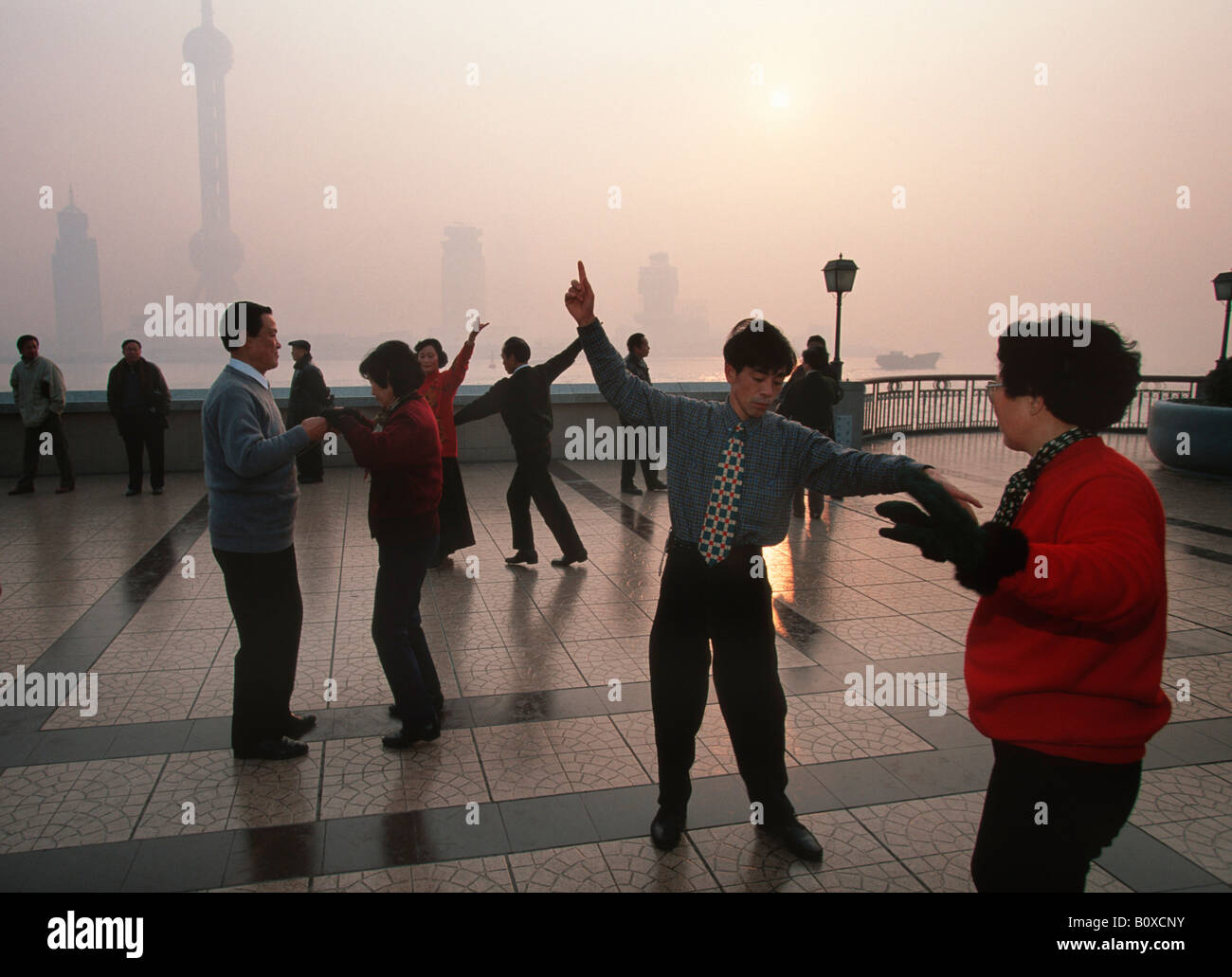 Chinese dancing on a square in the early morning, China, Shanghai Stock ...