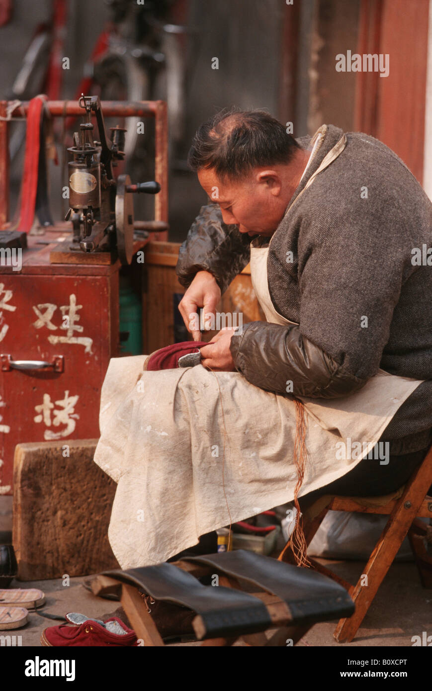 shoemaker at work, China, Shanghai Stock Photo - Alamy