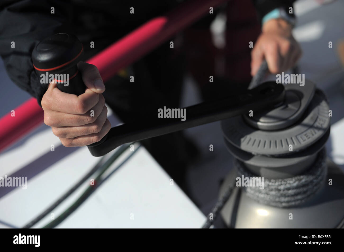 Sailor Sam Davies seen winching on board the Roxy sixty foot Transat ...