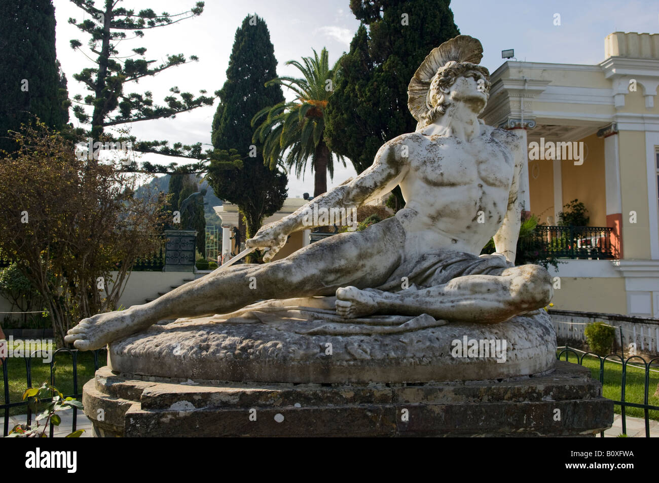 Marble statue of injured Achilles. Achilleion Museum, Corfu, Greece ...
