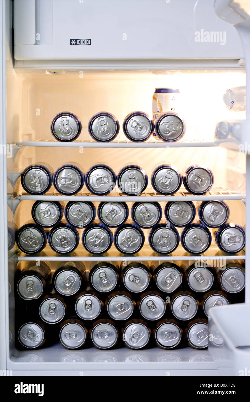 Fridge filled with cans of beer Stock Photo - Alamy