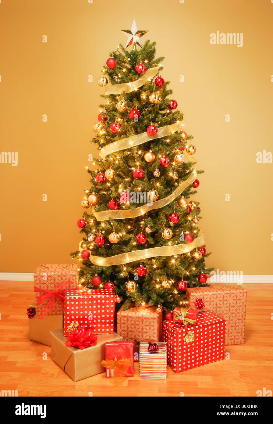 A Christmas tree with presents Stock Photo - Alamy