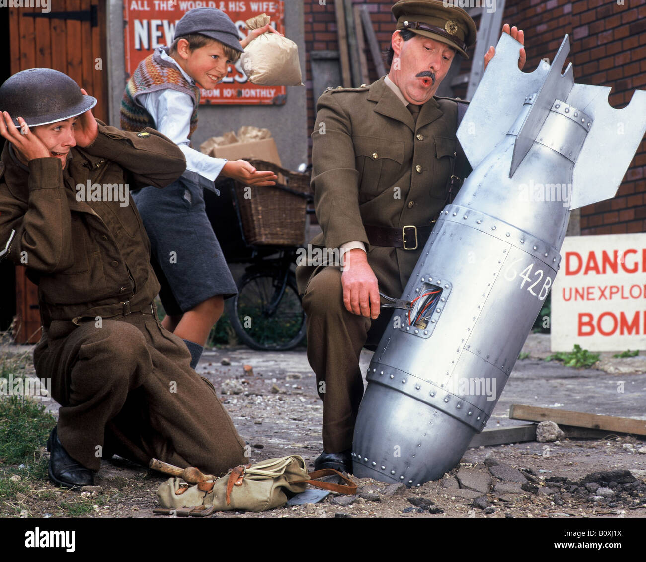 Bomb disposal team with comic bomb and schoolboy with paper bag Stock ...