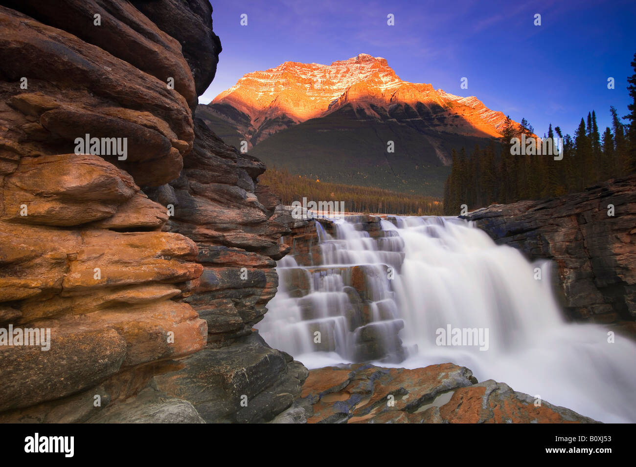 Beautiful mountain waterfall Stock Photo - Alamy