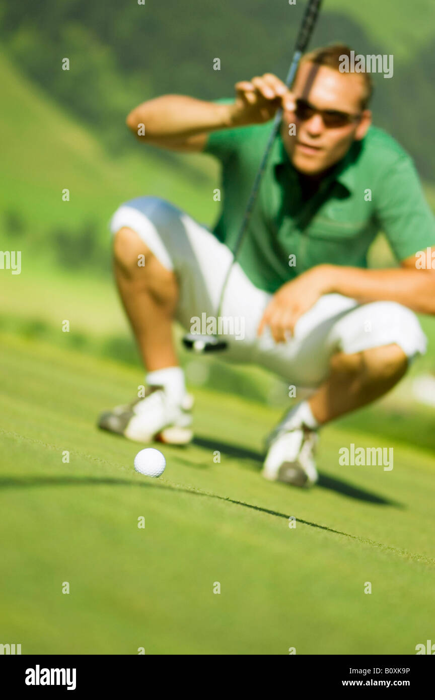 Golfer squatting on green hi-res stock photography and images - Alamy