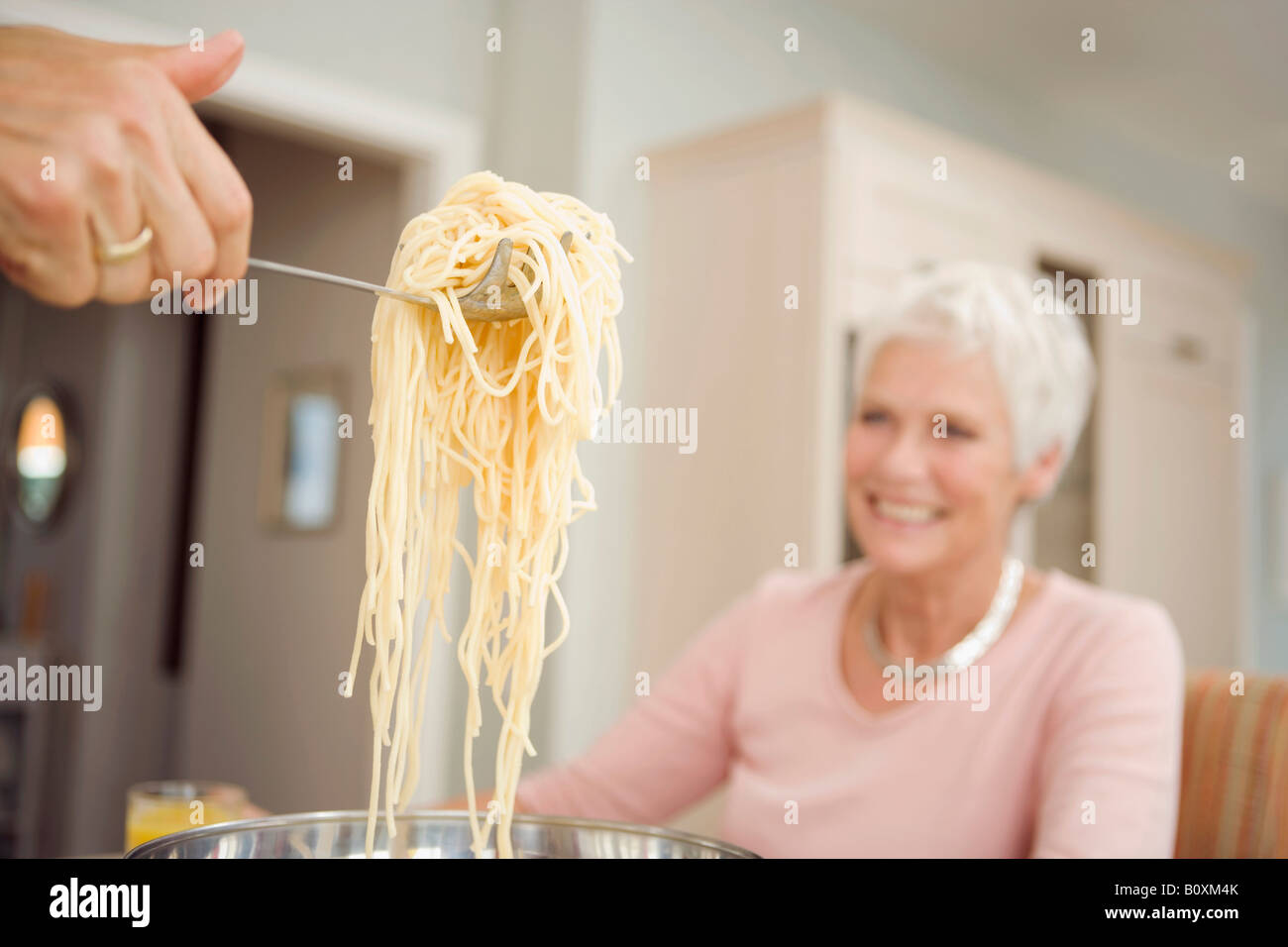 Family taking lunch at home Stock Photo - Alamy