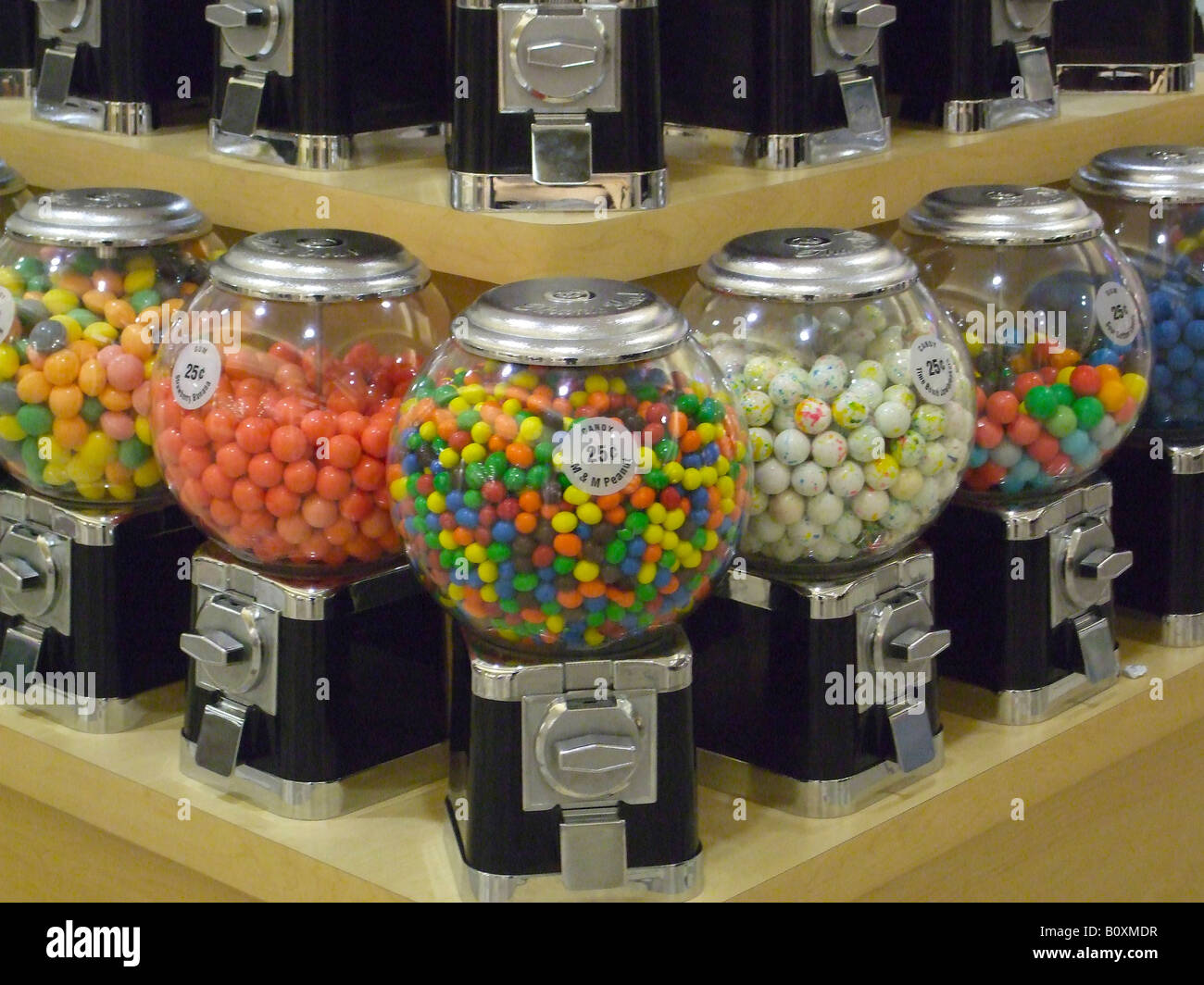 Candy on sale in traditonal dispensors Stock Photo - Alamy