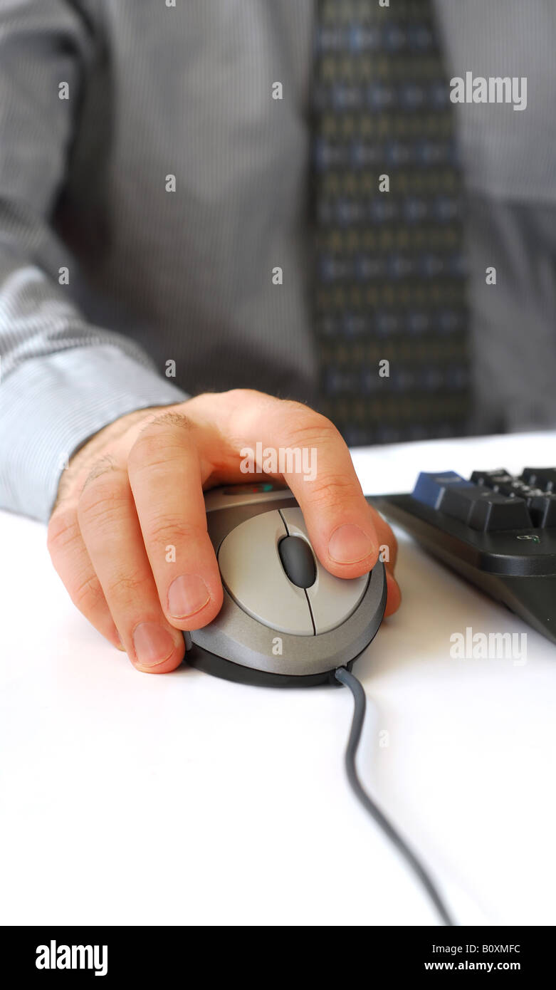 Closeup of man s hands with computer mouse and keyboard Stock Photo - Alamy