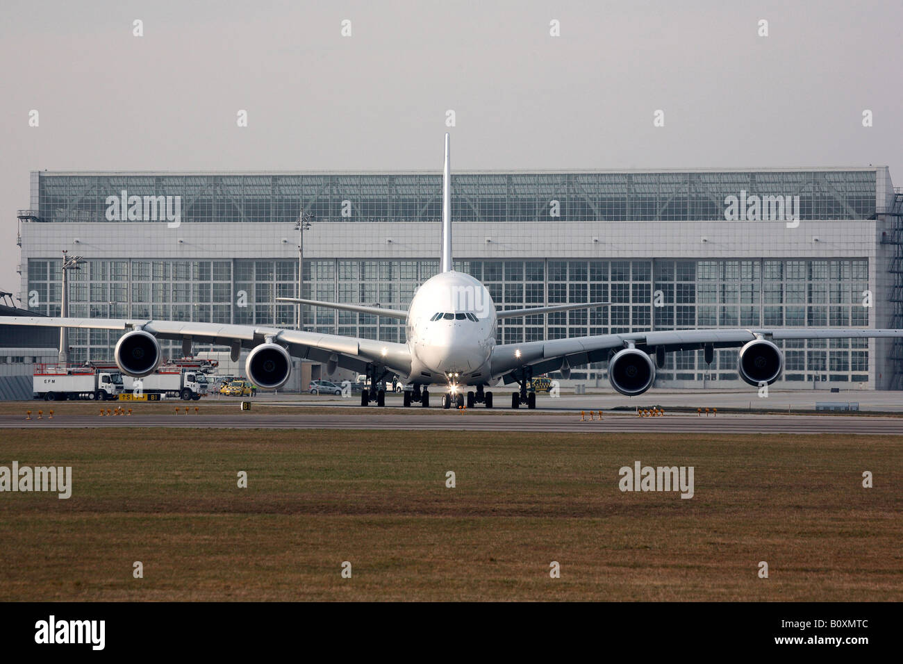 Aeroplane on runway Stock Photo - Alamy
