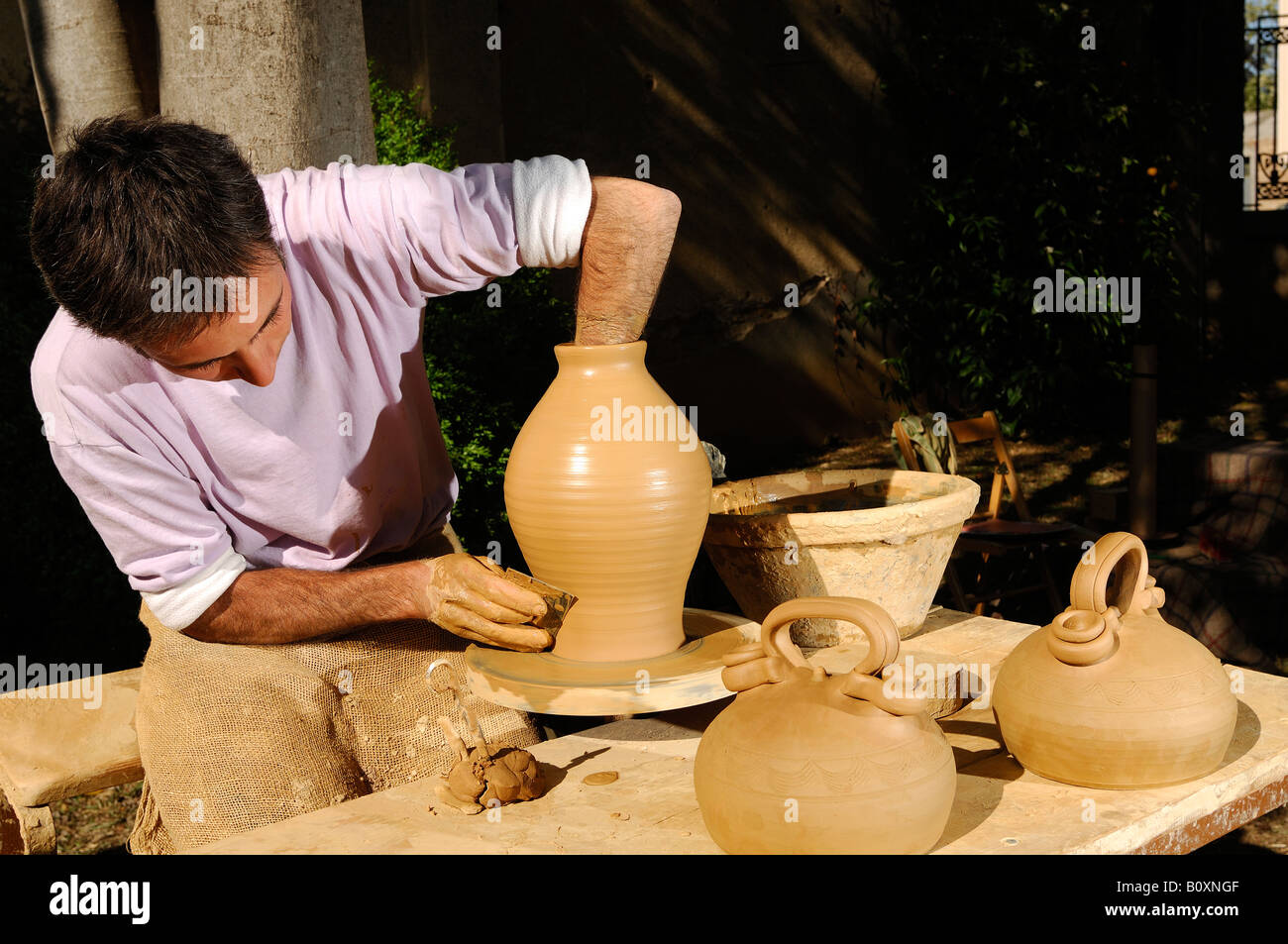 Ceramist creating a typical object by hand. Traditional technique Stock ...